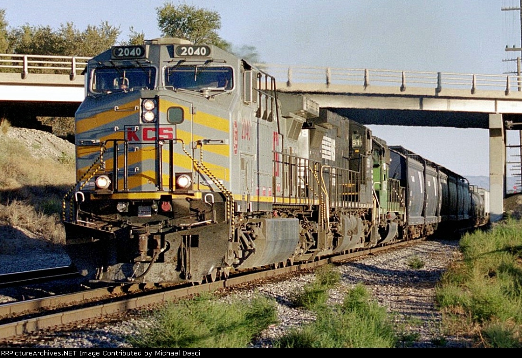 KCS AC-4400CW #2040 leads a westbound at Impala Rd.